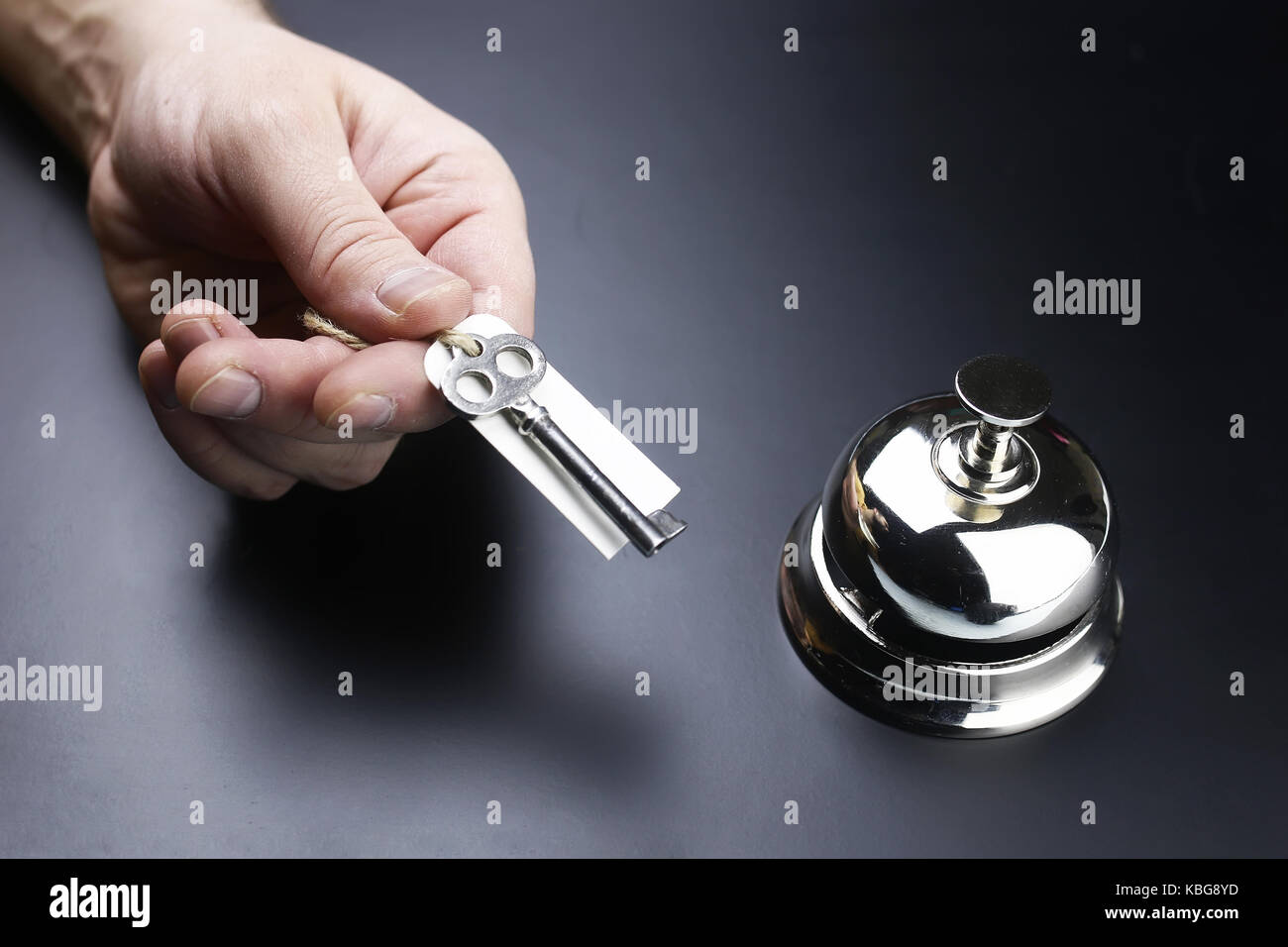 bell and the key at the reception in the hotel Stock Photo - Alamy