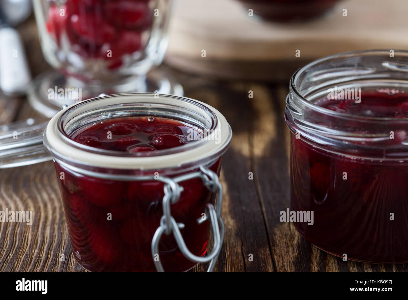 Dogwood jam and ripe cornel berries on rural wooden background Stock ...