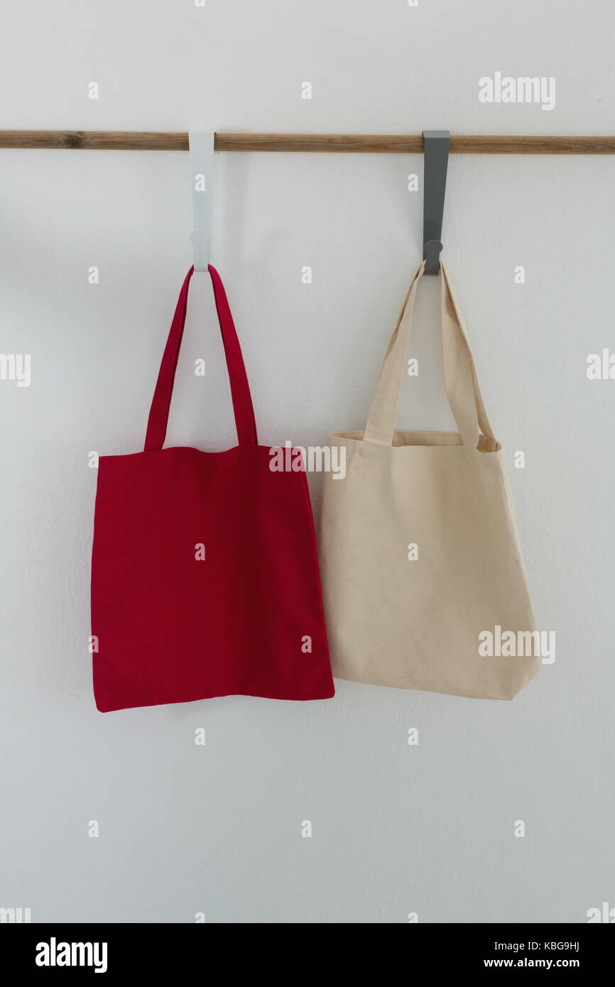 Bags hanging on hook hi-res stock photography and images - Alamy