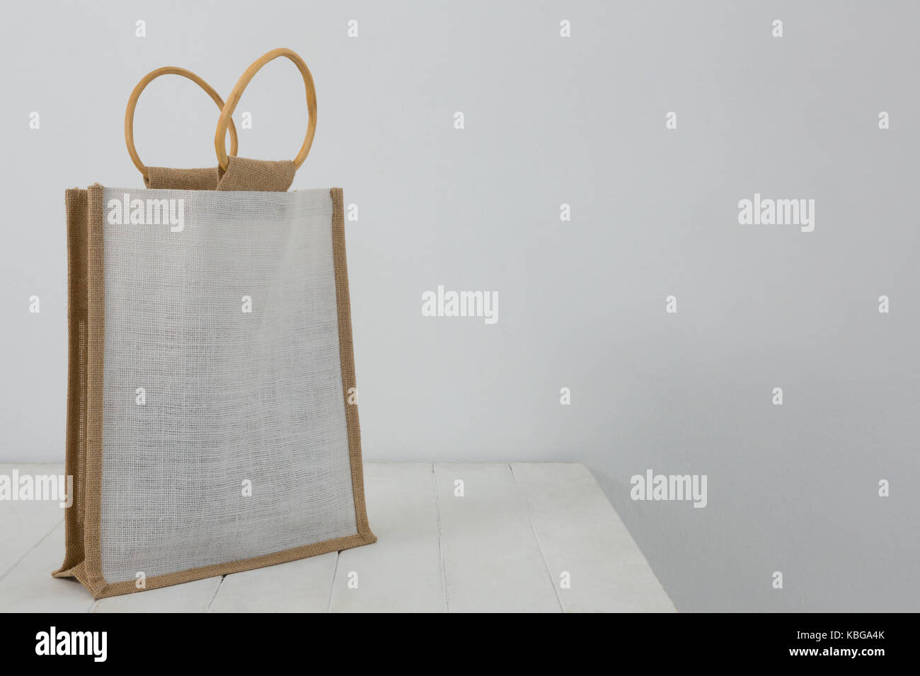 Close-up of bag on table against white wall Stock Photo - Alamy