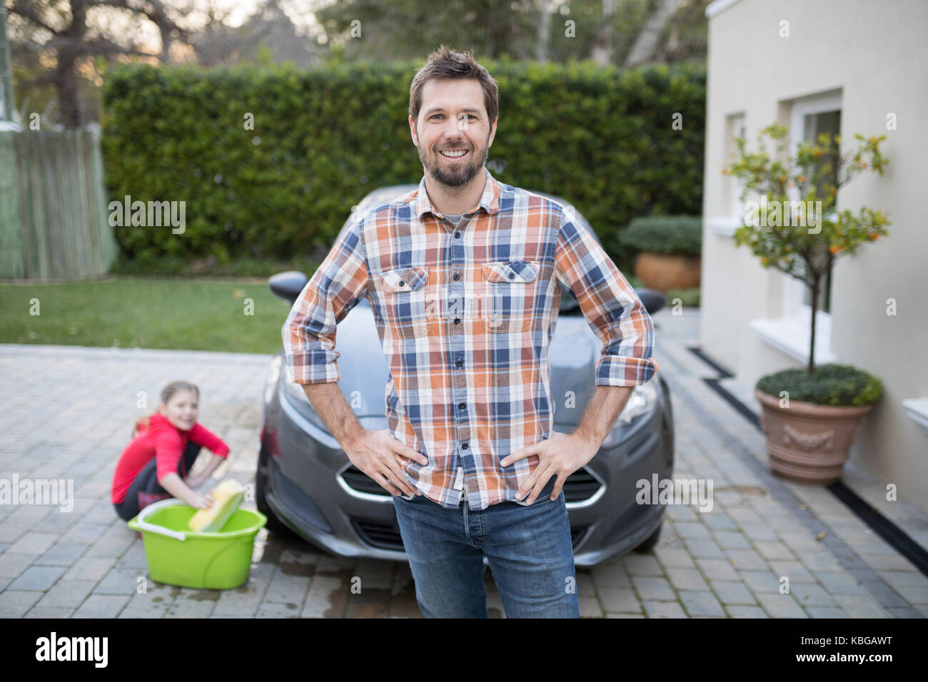 Portrait of man standing near the car Stock Photo - Alamy