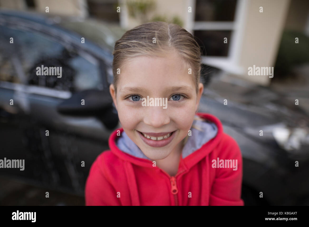 Girl standing with car hi-res stock photography and images - Alamy