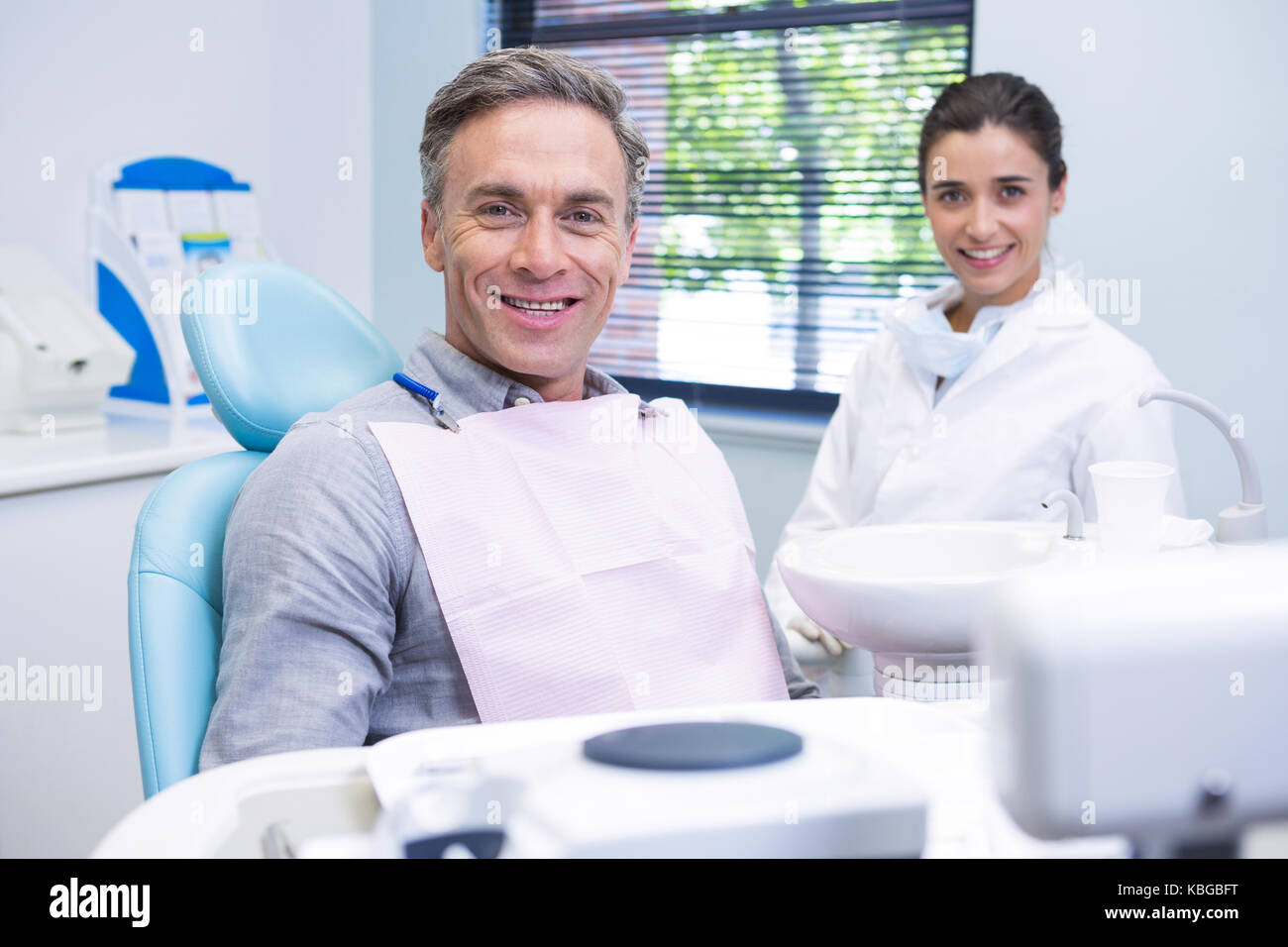 Portrait female doctor with patient at medical clinic Stock Photo - Alamy