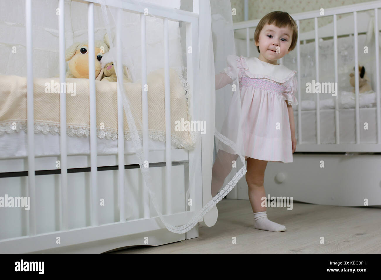 litle kid stand at bedroom Stock Photo - Alamy
