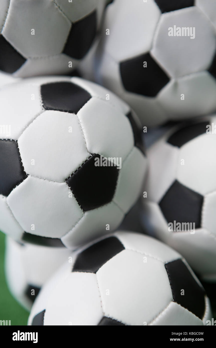 Close-up of stacked football soccer balls Stock Photo - Alamy