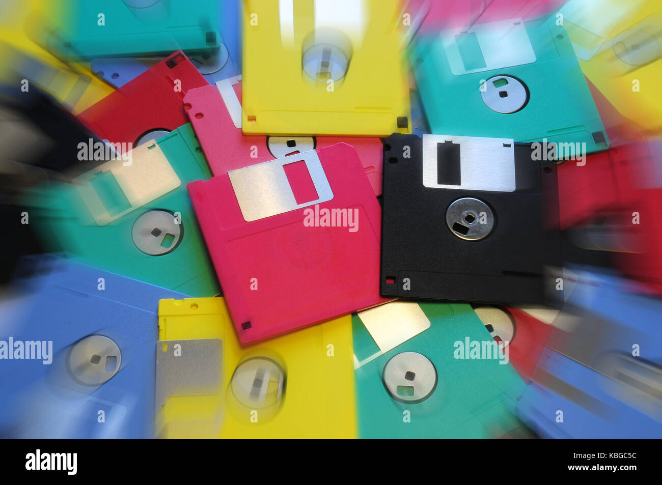 Multicolored floppy disc 3.5 5.1/4 for old computers. Aligned as ...