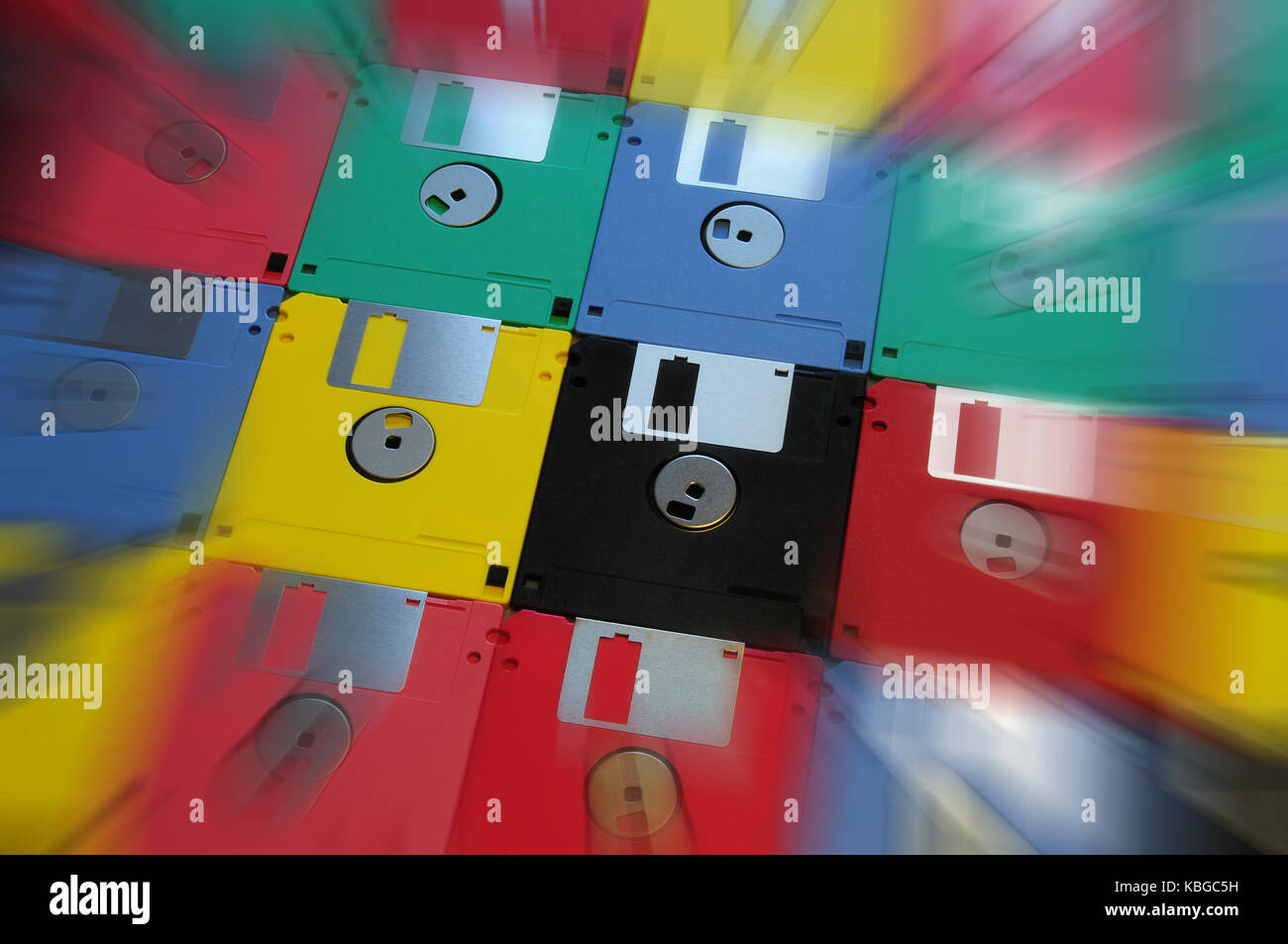 Multicolored floppy disc 3.5 5.1/4 for old computers. Aligned as ...