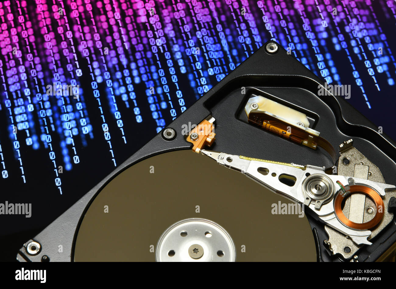close up of open hard disk with binary effects Stock Photo - Alamy