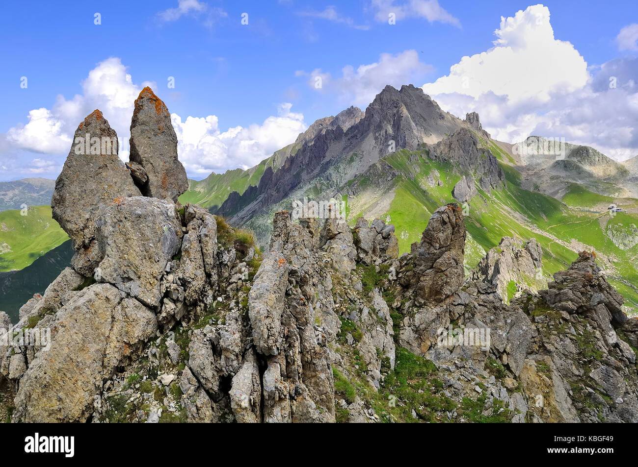 beautiful rocky mountain and greenery pasture Stock Photo - Alamy