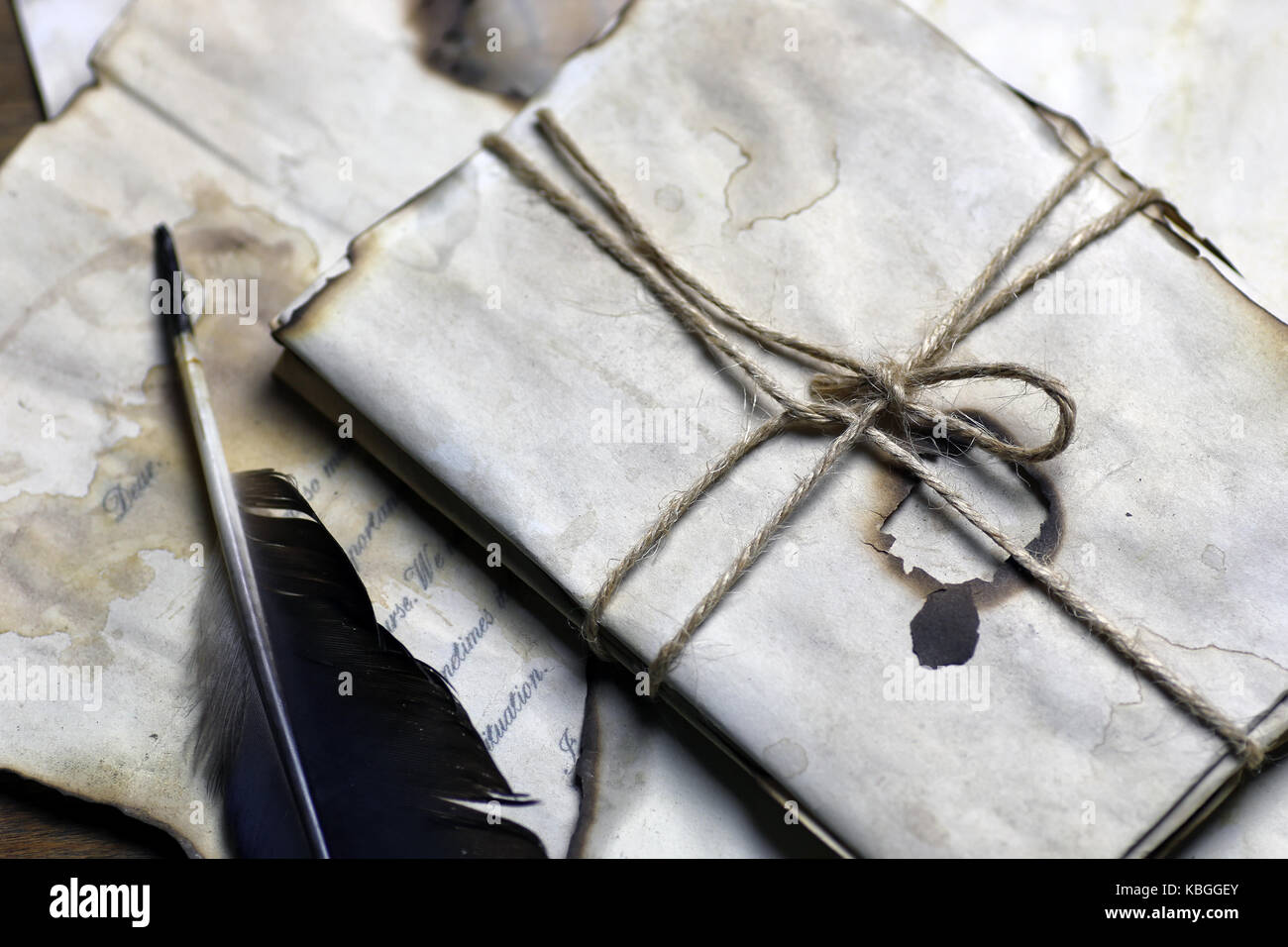old paper letter feather Stock Photo - Alamy