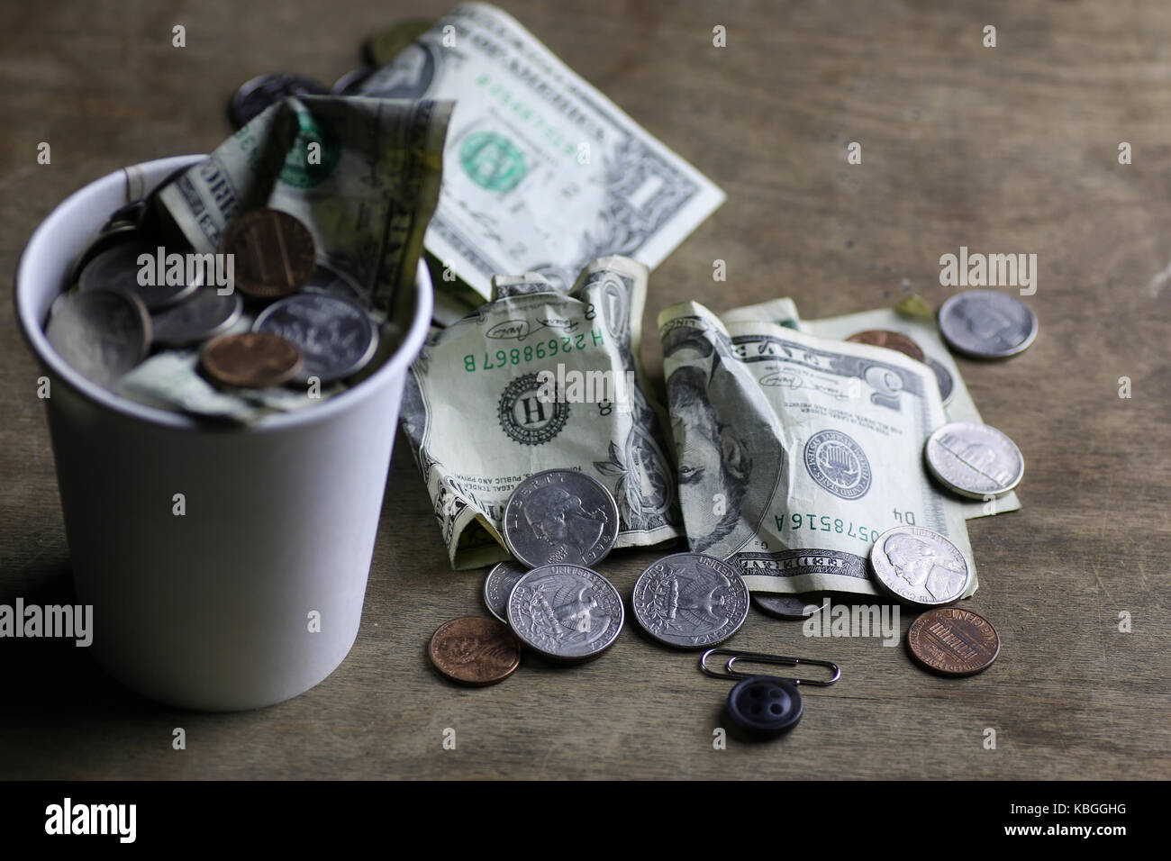 begging coin money Stock Photo - Alamy