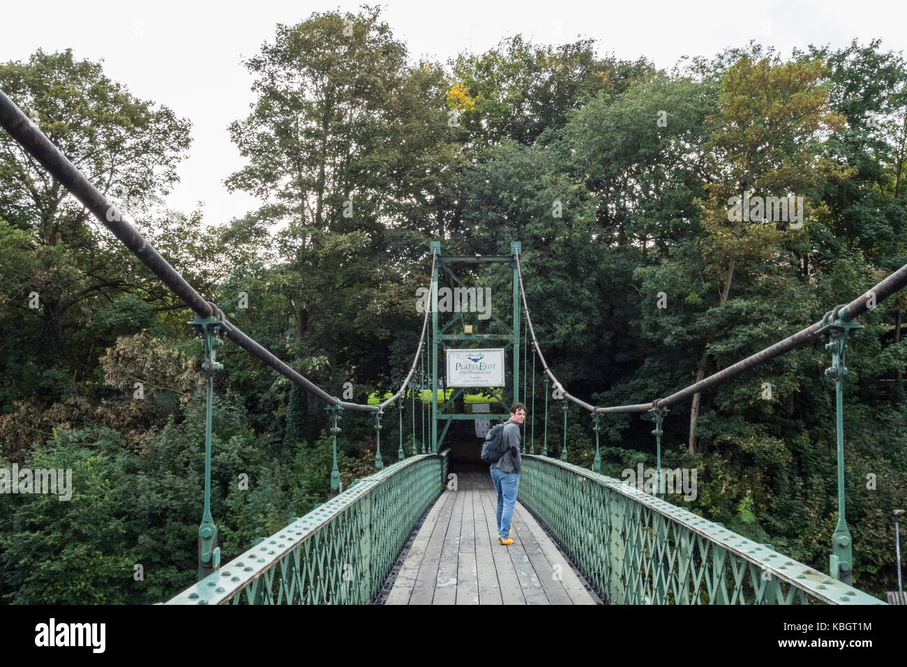 The suspension bridge to Port Hampton's Platts Eyot in Hampton, London ...