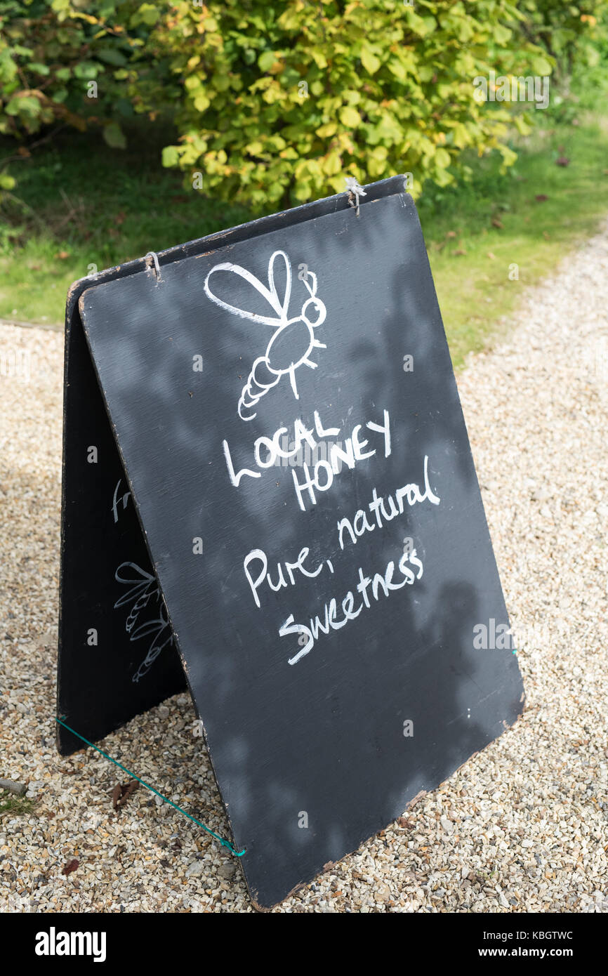 Local honey chalkboard sign at Daylesford Organic farm shop autumn ...