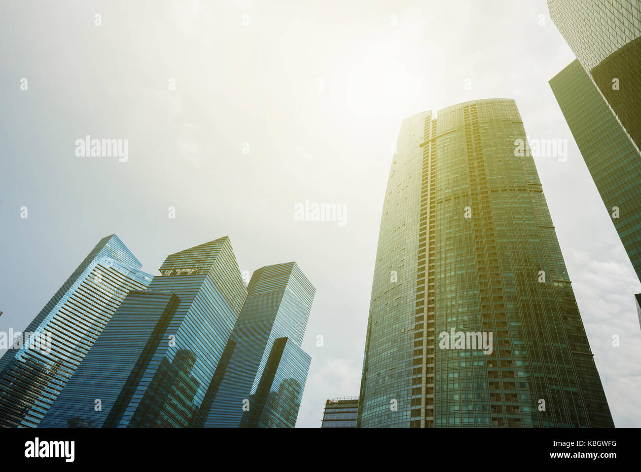Skyscraper with sky and sunlight, building in Singapore Stock Photo - Alamy