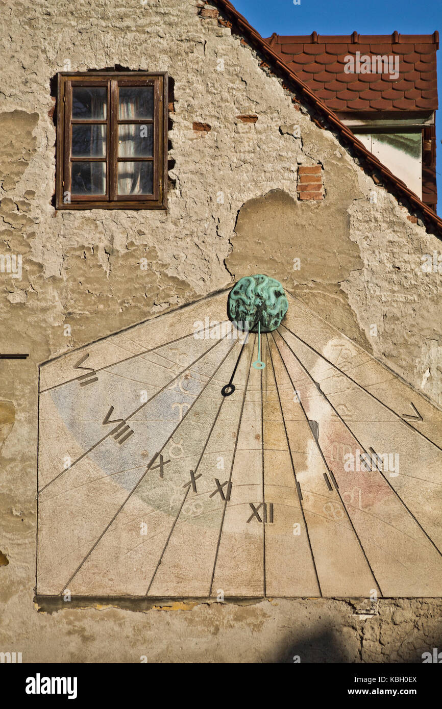 Vintage sun clock on a wall in Zagreb Stock Photo - Alamy
