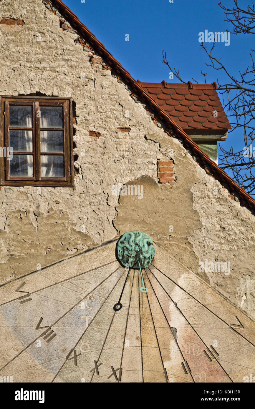 Vintage sun clock on a wall in Zagreb Stock Photo - Alamy