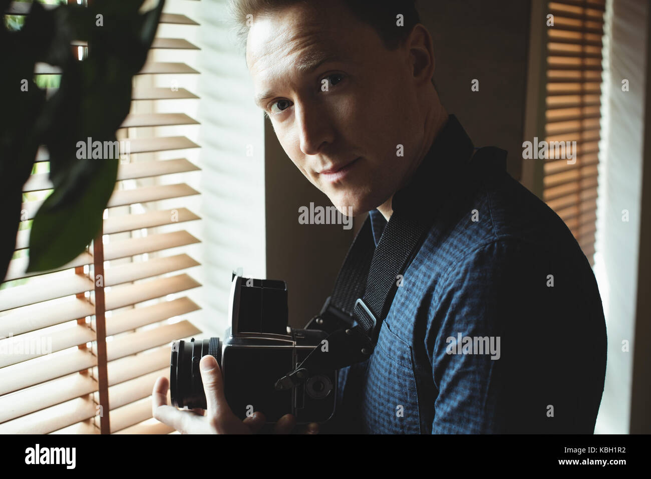 Handsome man vintage photo camera hi-res stock photography and images ...