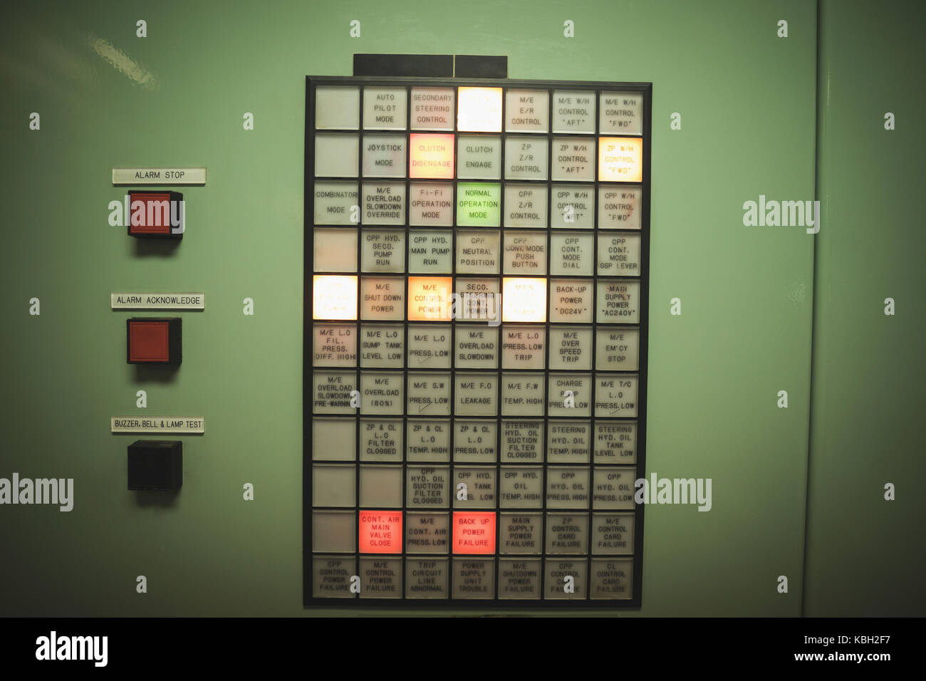 Illuminated engine control room in ship Stock Photo - Alamy