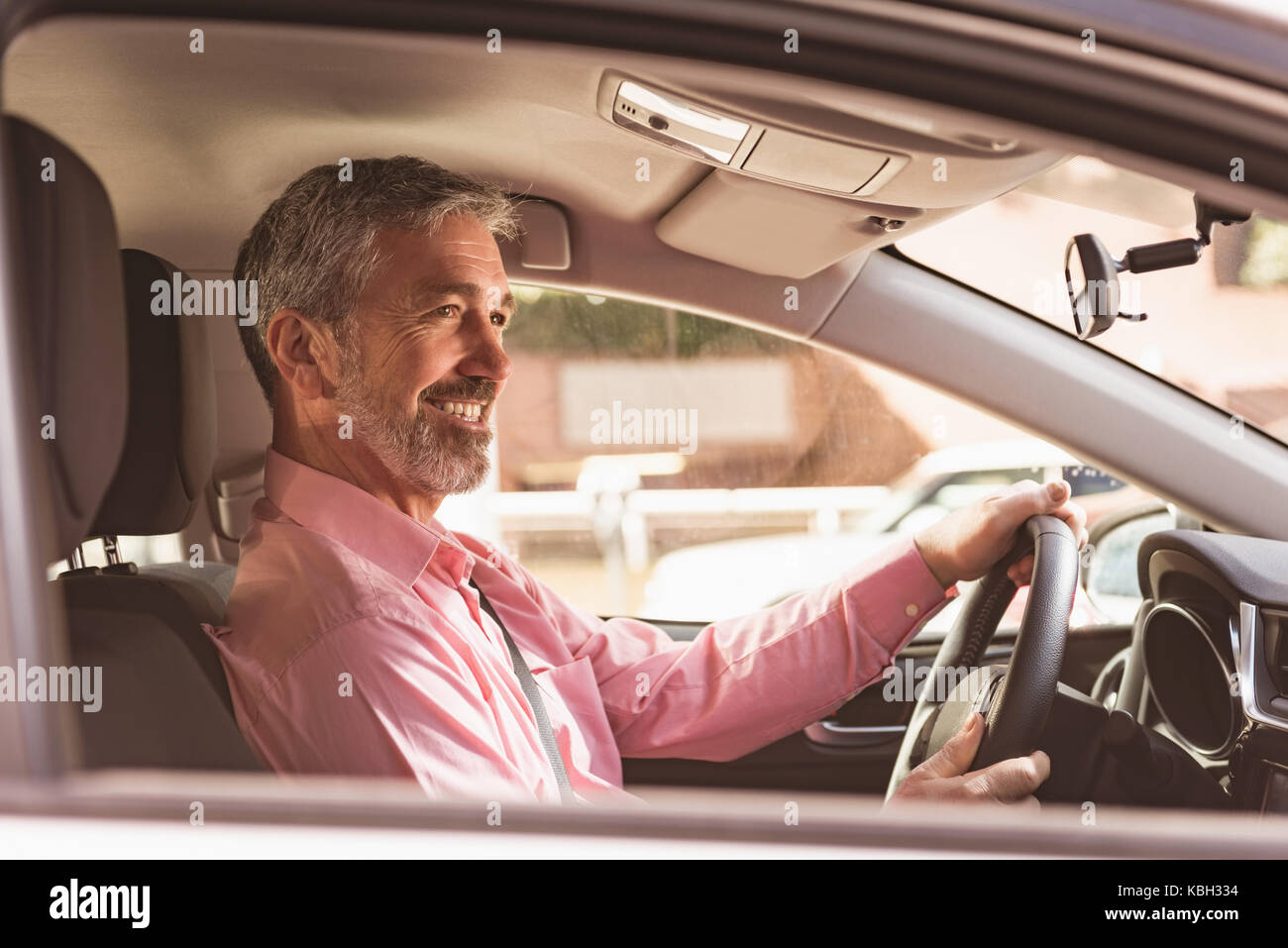 Happy man driving car hi-res stock photography and images - Alamy