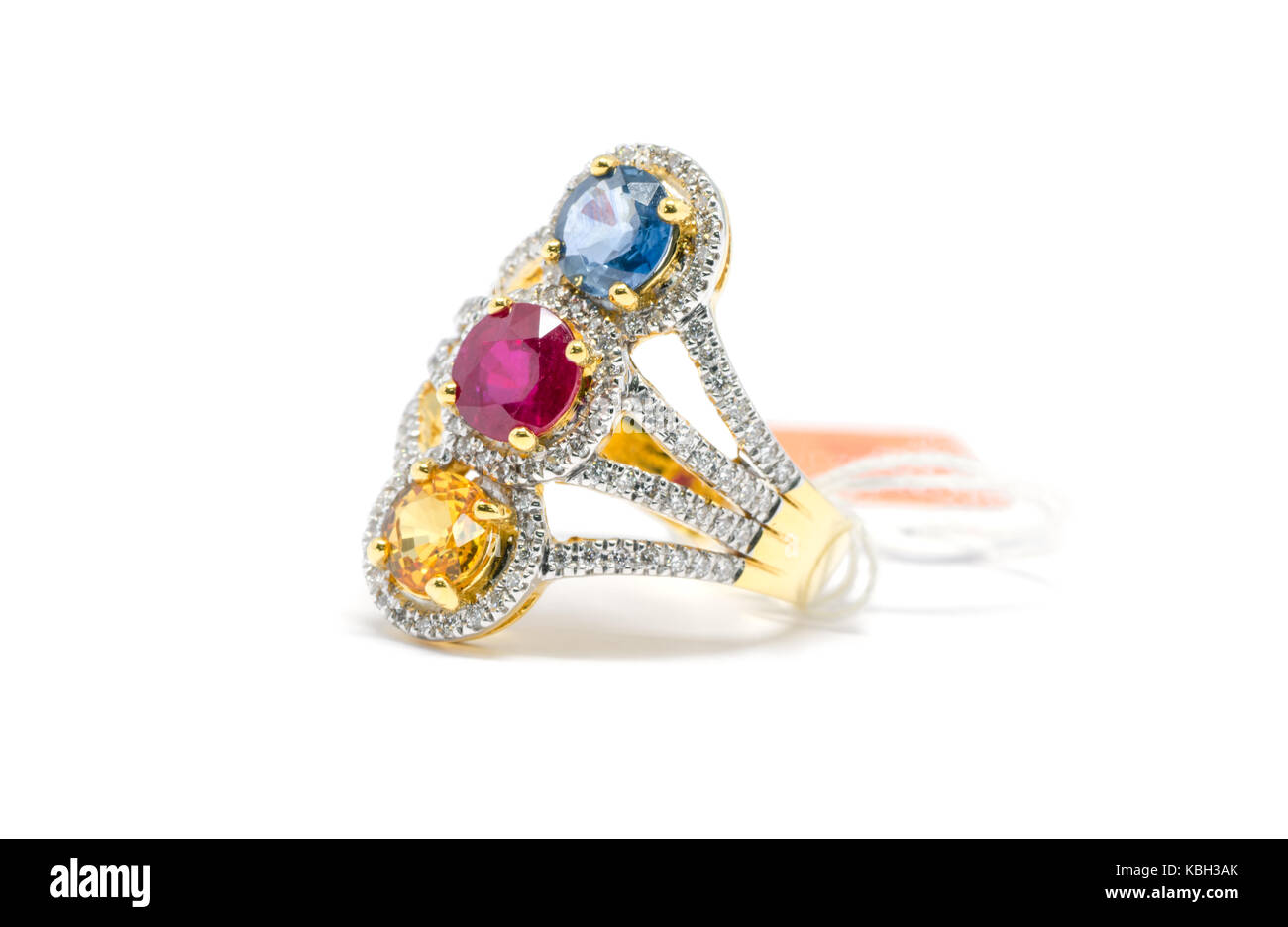 Closed up Red, yellow and blue Diamond with white diamond and gold ring ...