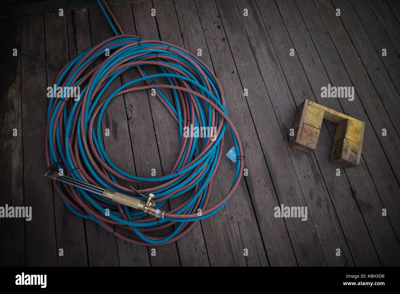 Pipe on wooden deck of ship Stock Photo - Alamy