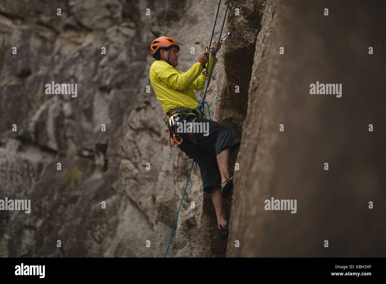 Traveler man climbing in hi-res stock photography and images - Alamy