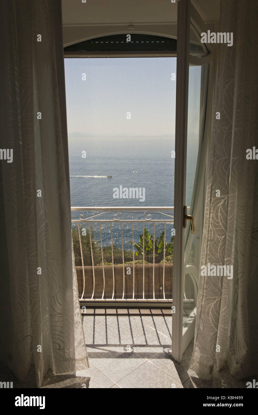 Amalfi, Italy, Augut 12 2014: Window facing the sea. A beautiful and ...