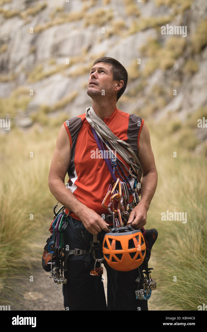 Handsome man standing at countryside Stock Photo - Alamy
