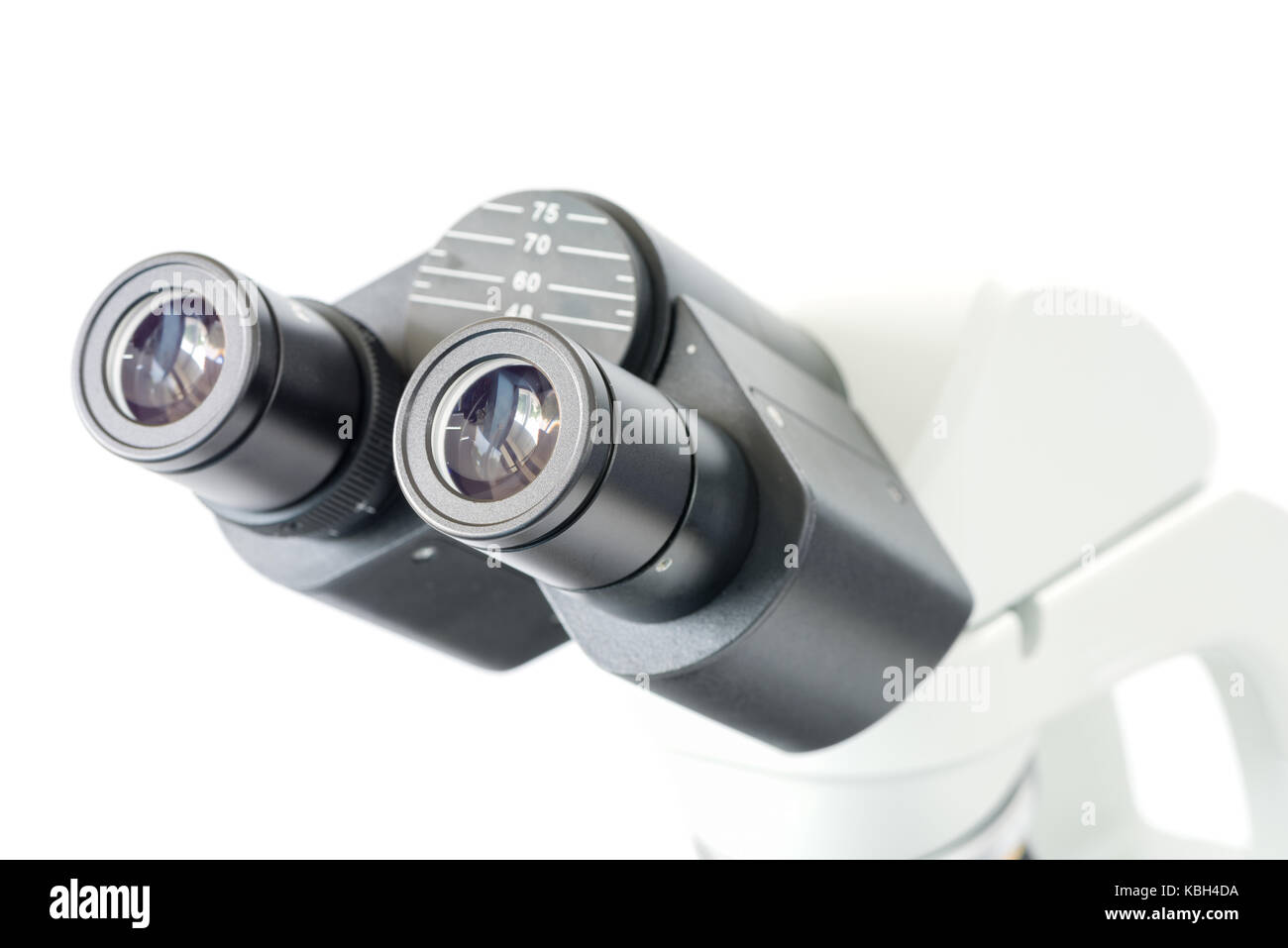 closed up of microscope isolated on white background, science and ...