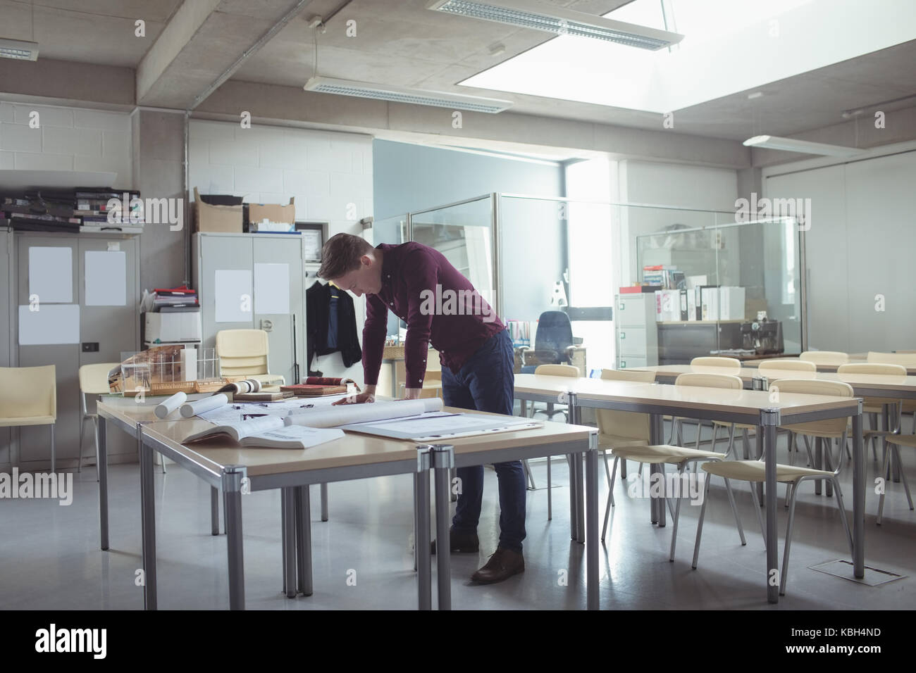 Architect working at desk in studio Stock Photo - Alamy