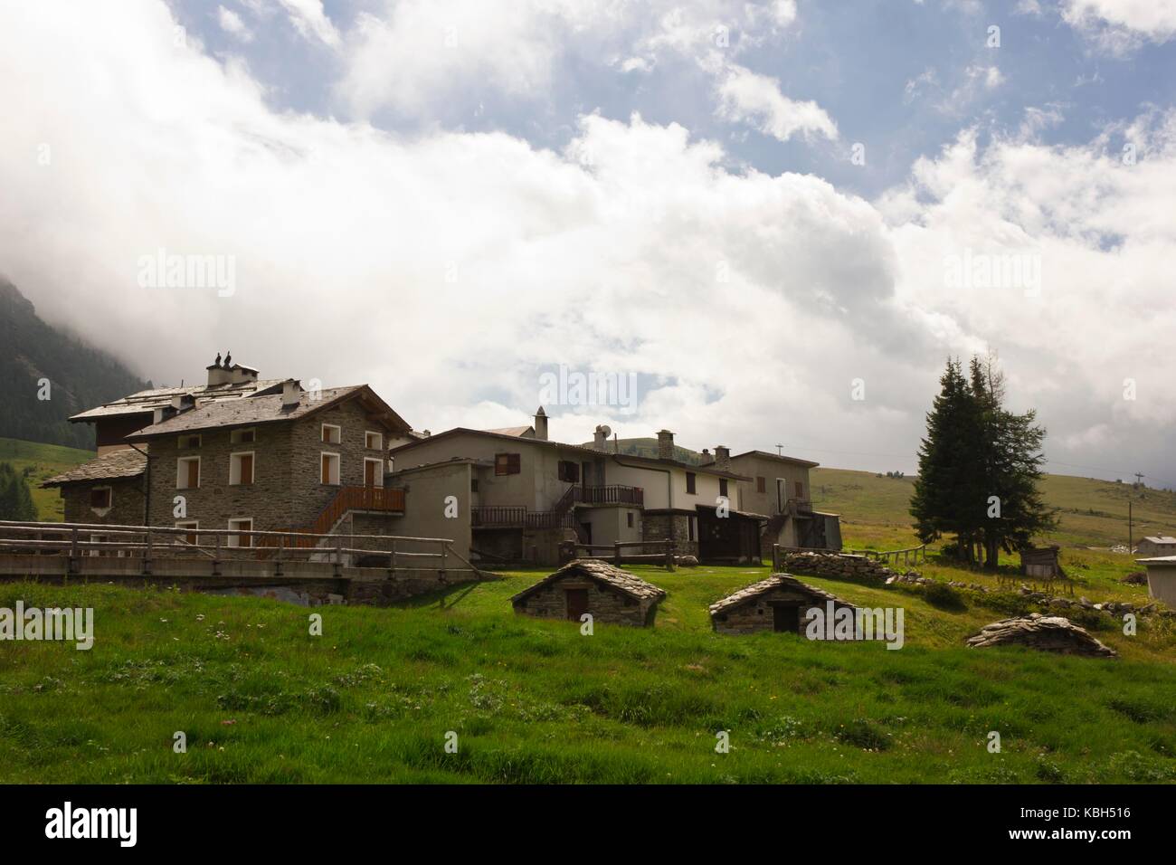MADESIMO, ITALY - AUG 18 2014: Traditional stone house in the valley ...