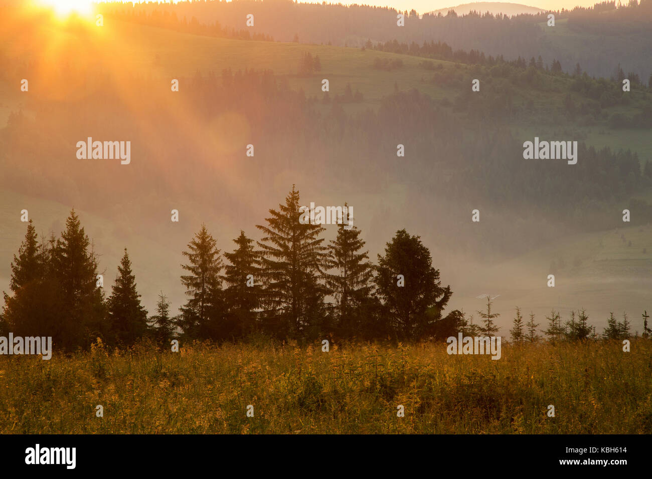 Beautiful scenery of the mountain range at sunrise Stock Photo - Alamy