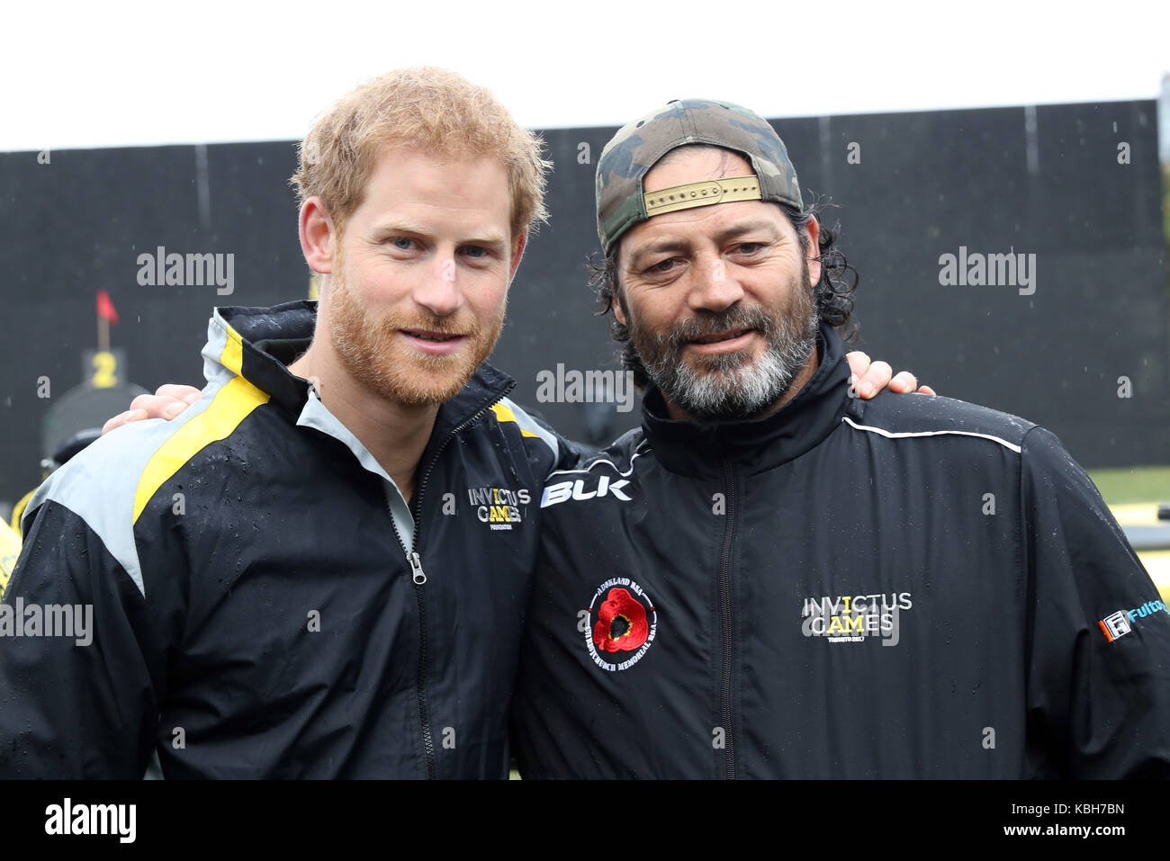 Prince Harry with Willie Apiata of New Zealand as he attends the ...