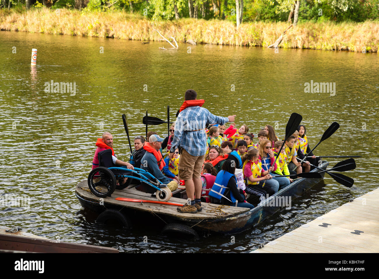 Kids ride in a boat and other environmental education activities at ...
