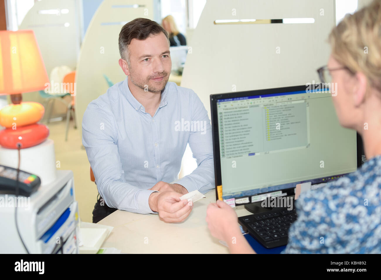 giving the number ticket Stock Photo - Alamy