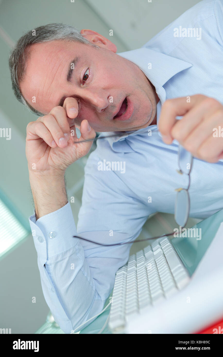 overwork in office Stock Photo - Alamy