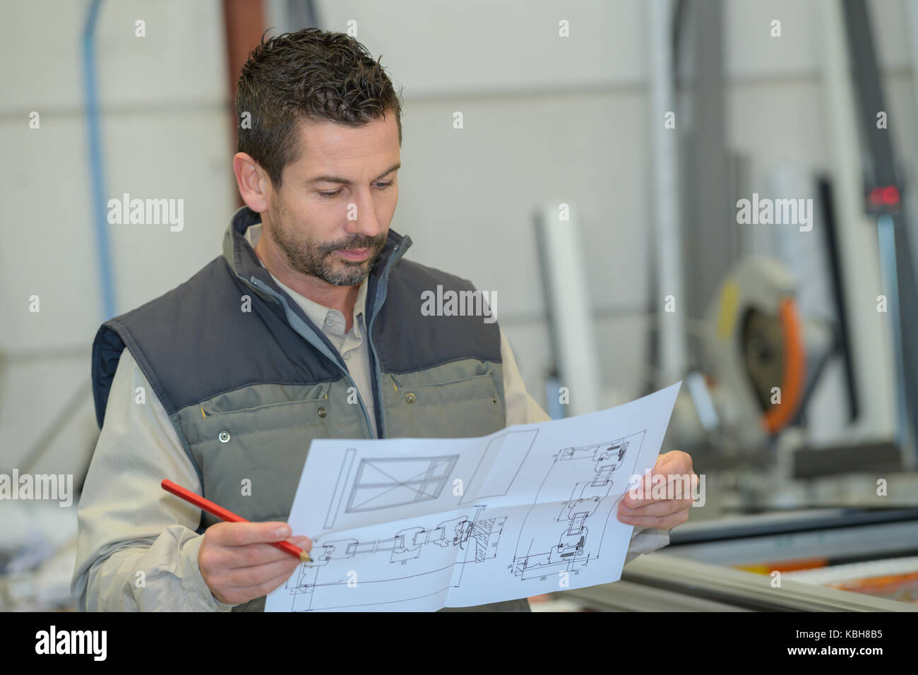 product engineer studying the new design Stock Photo - Alamy