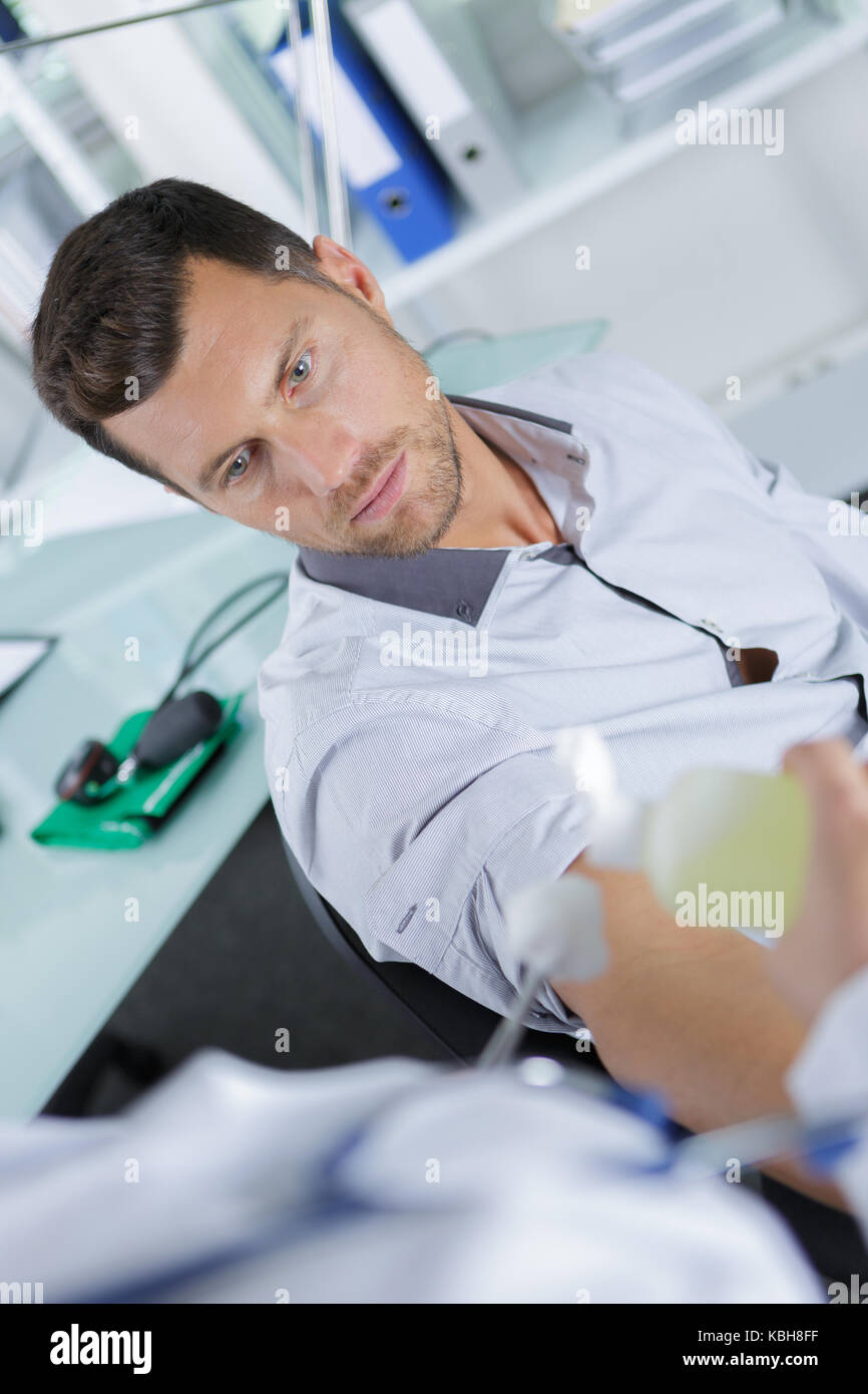 handling down a sample Stock Photo - Alamy