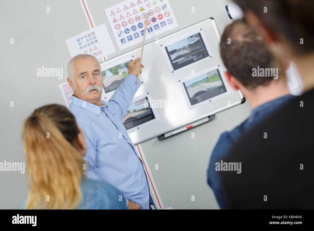 pointing at the traffic signs Stock Photo - Alamy
