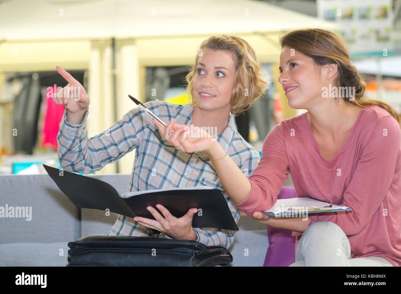 girls pointing object Stock Photo - Alamy