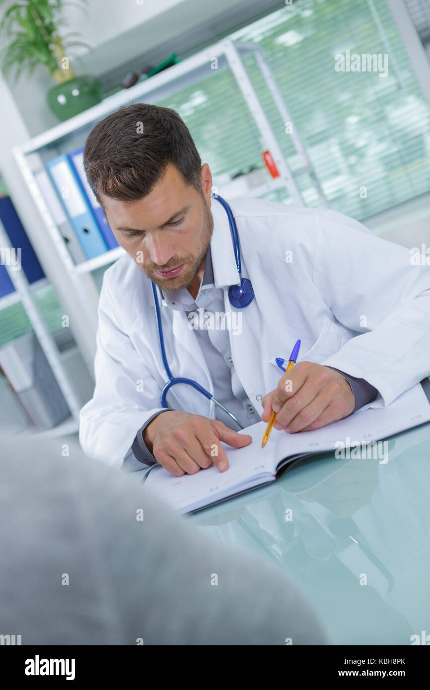 doctor studying the case Stock Photo - Alamy