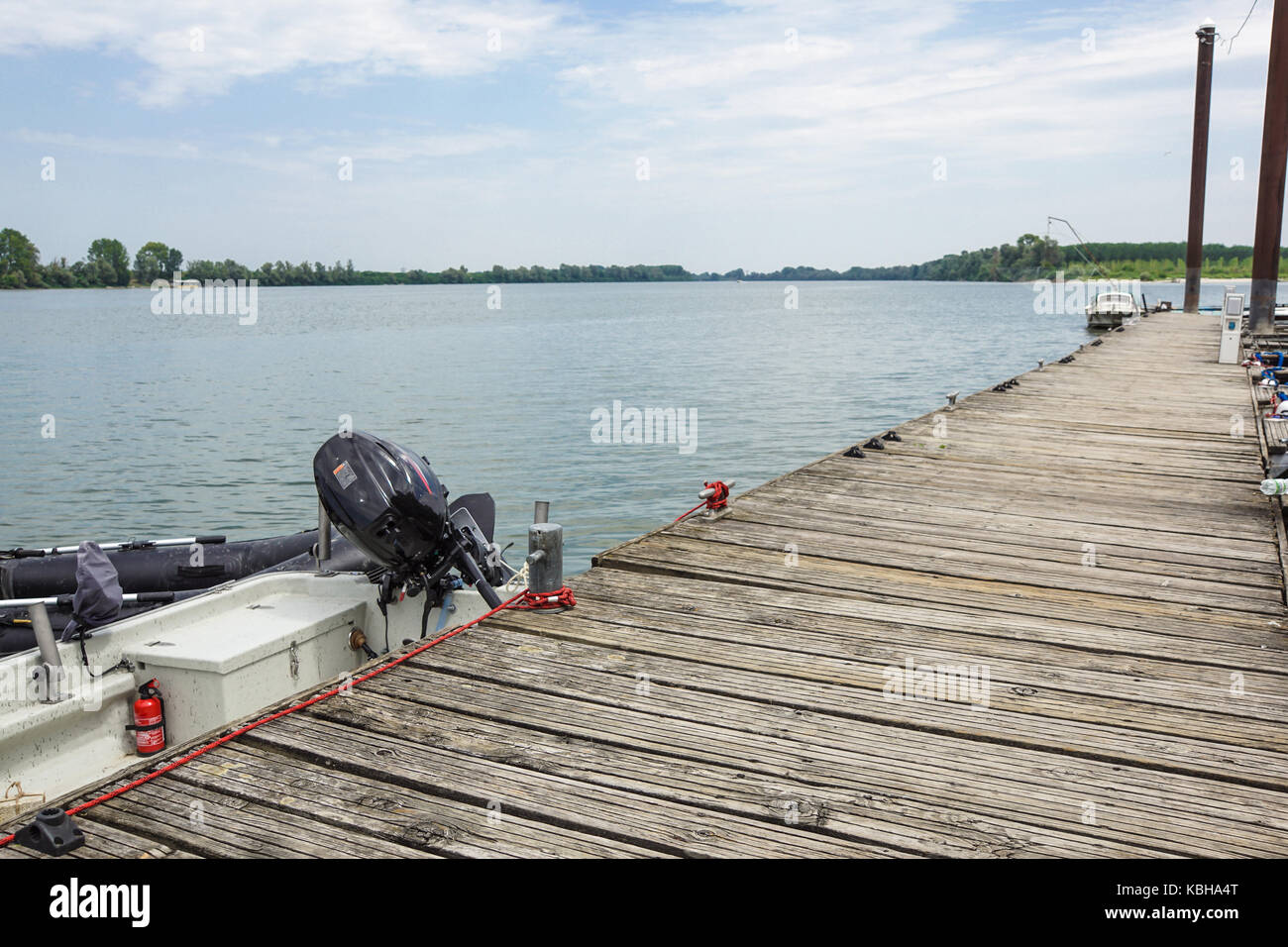 boat detail with wood pier on a river Stock Photo - Alamy