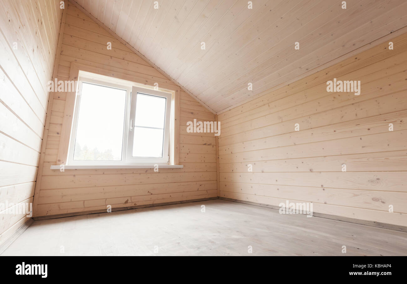Attic room empty interior, new wooden walls and window Stock Photo - Alamy