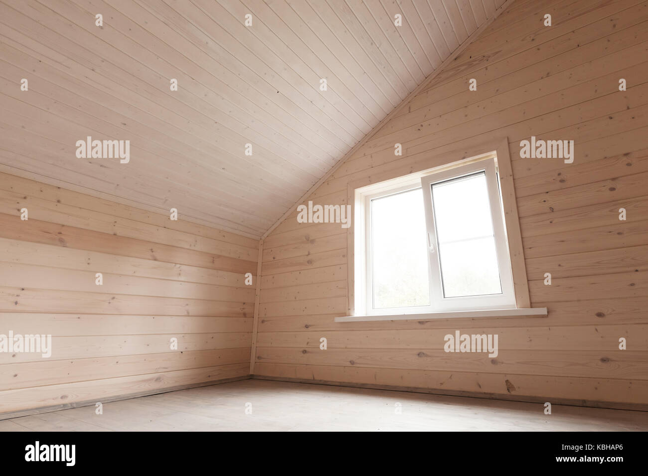 Empty new attic room interior, wooden walls and window Stock Photo - Alamy