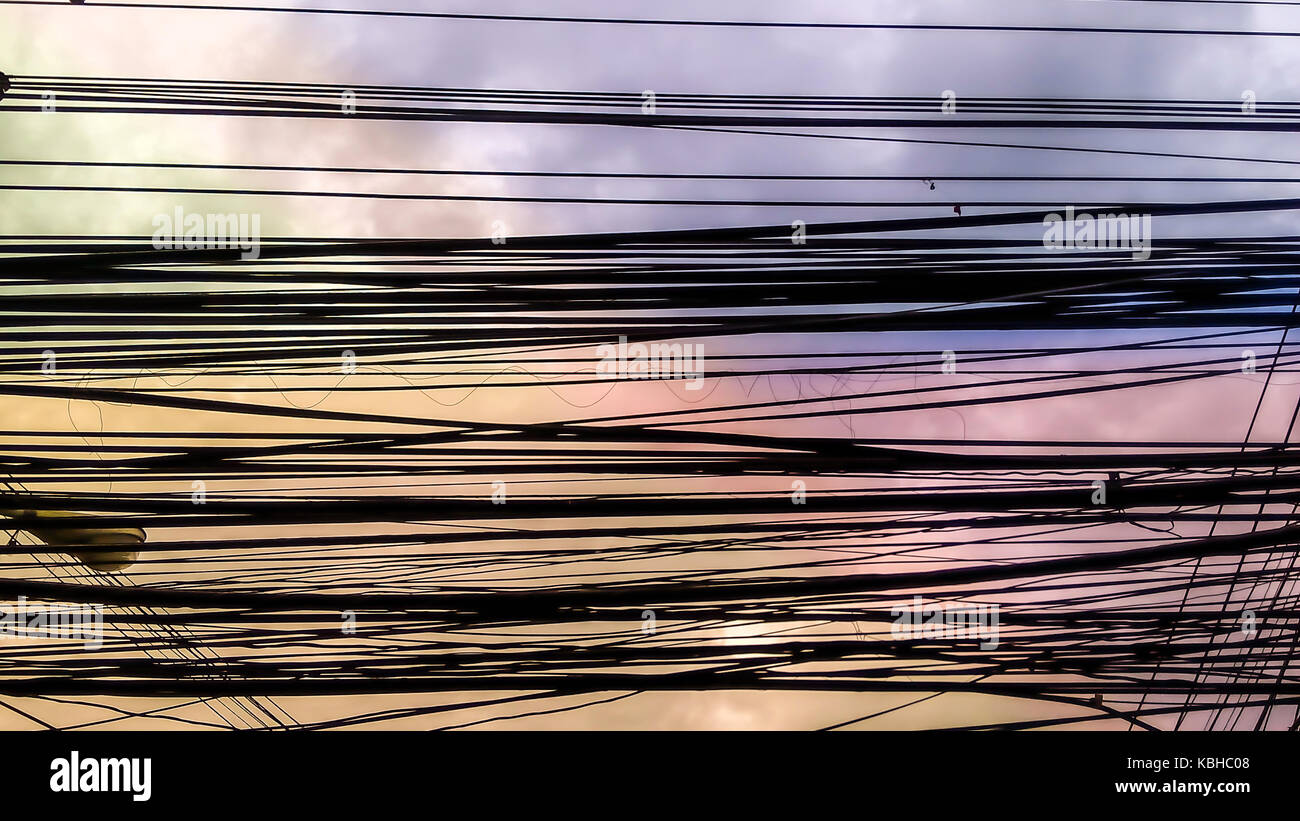 power electric lines and colorfull fantacy sky Stock Photo - Alamy