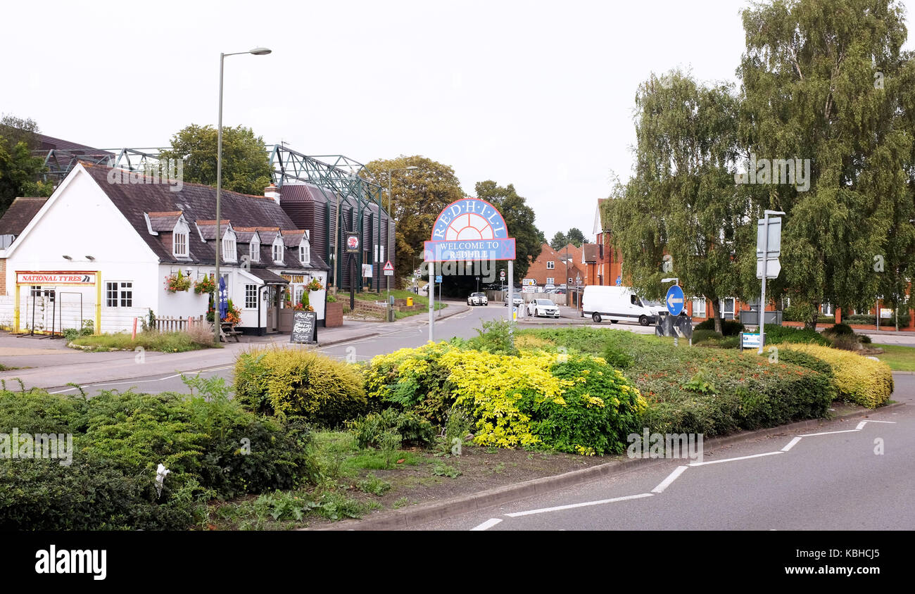 Welcome to Redhill sign on roundabout Surrey UK Stock Photo - Alamy