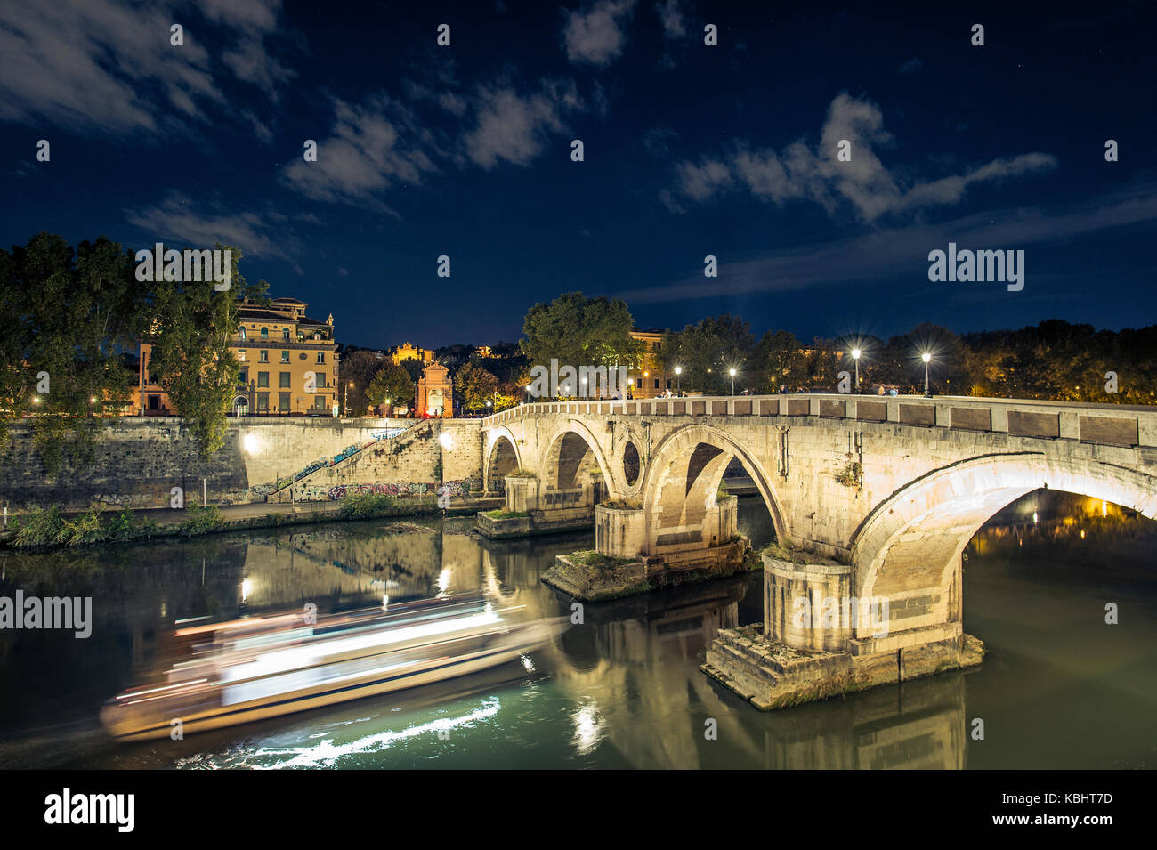 Night scape of the ancient Roman Bridge at night. Ponte Sisto is a ...