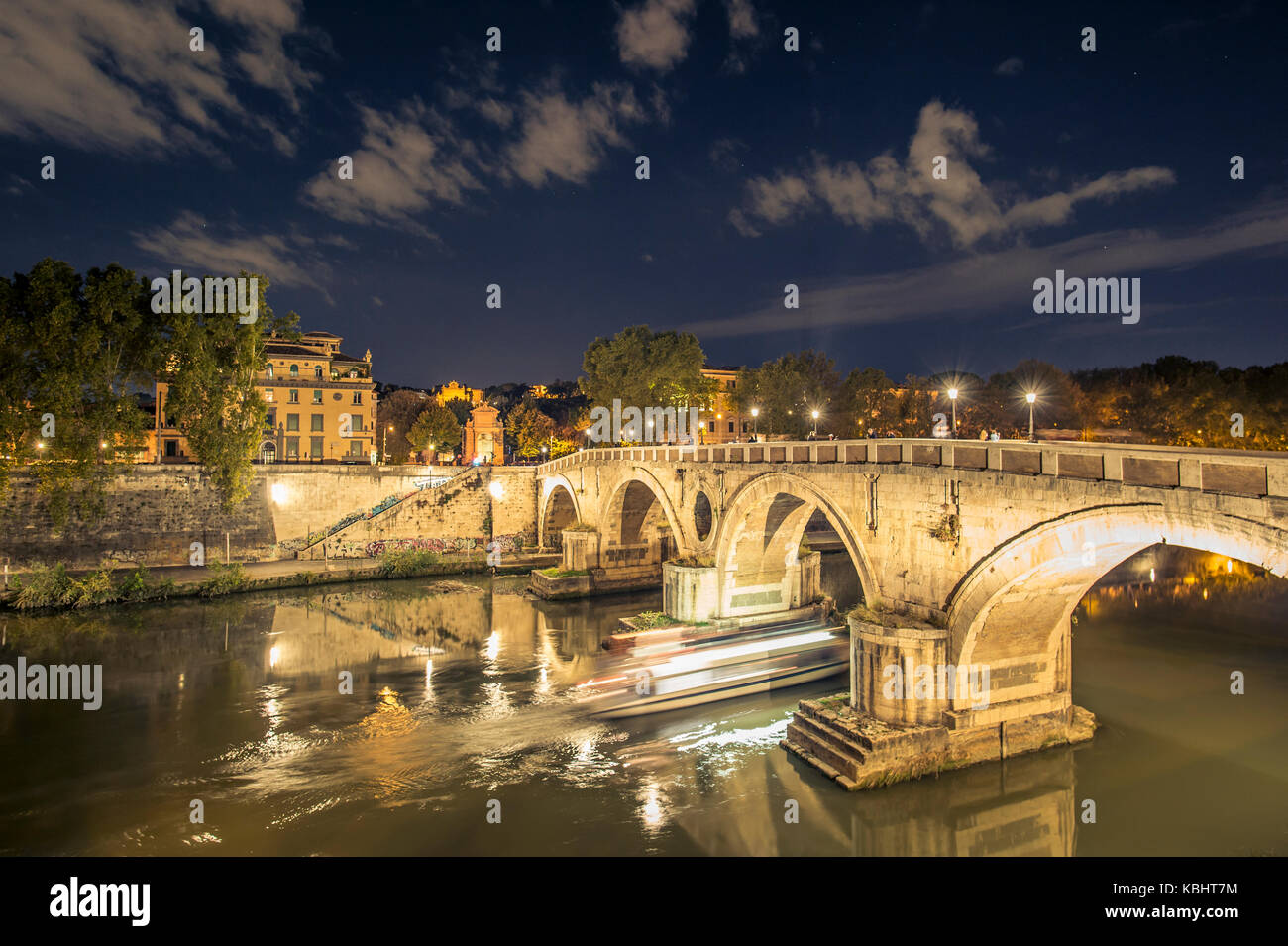 Night scape of the ancient Roman Bridge at night. Ponte Sisto is a ...