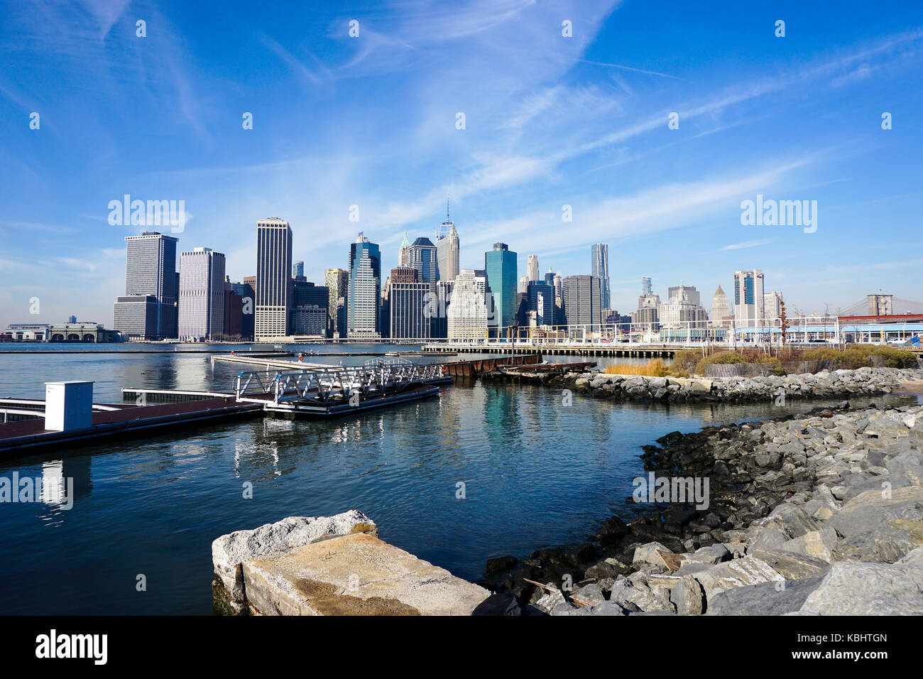 New York Skyline from Brooklyn side of Hudson River, Midday blue sky ...