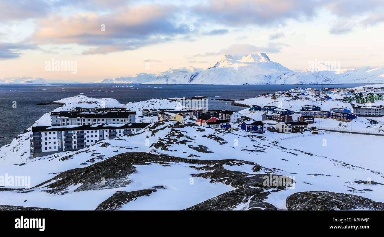 Morning view to the stones and distant streets of Nuuk city, with ...